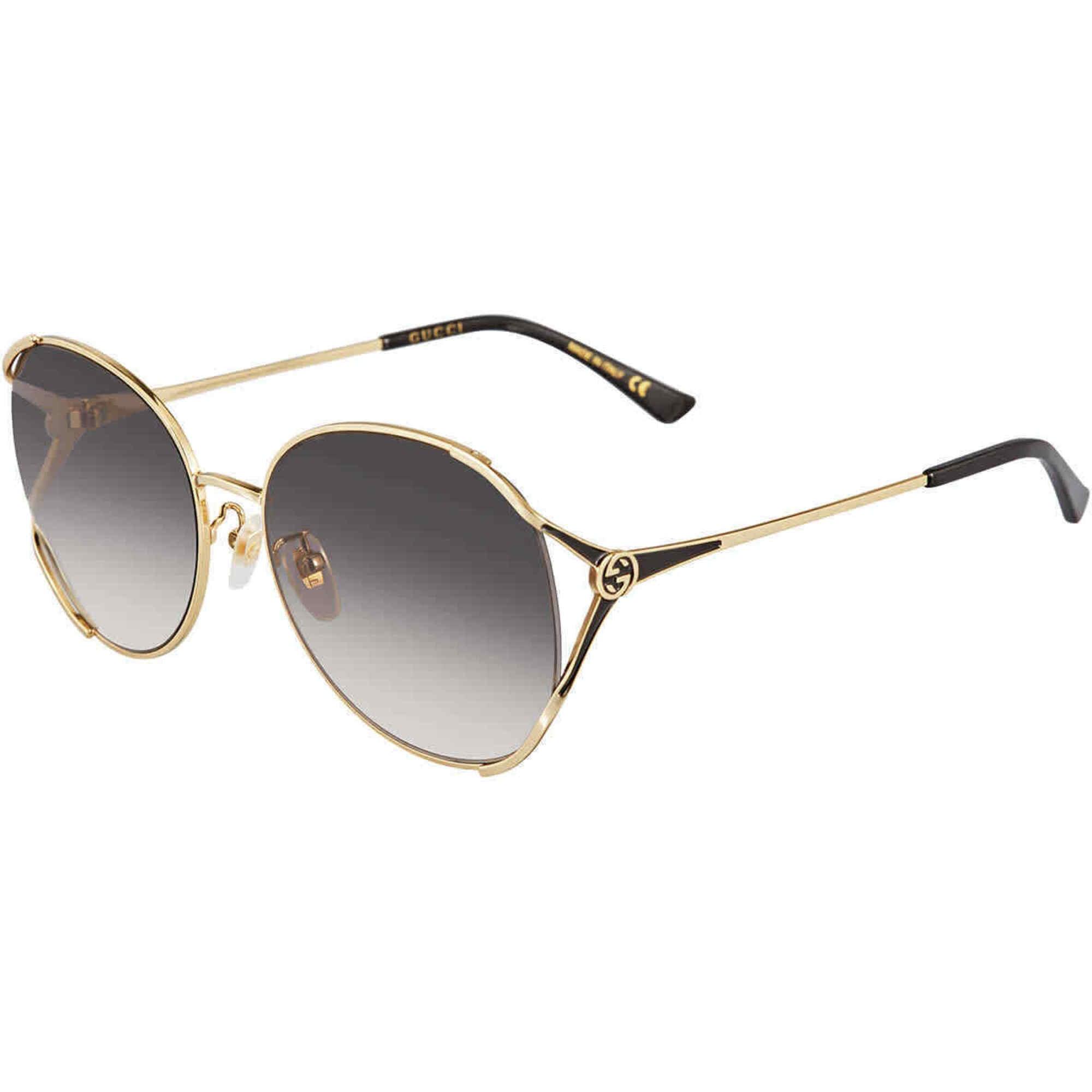 Gucci Women's Sunglasses - Adjustable Nose Pads Gold and Black Frame